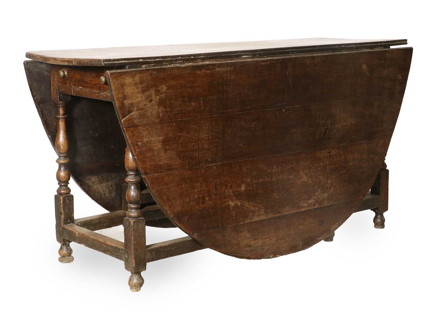 Lot 296 - An Oak Six-to-Eight-Seater Dropleaf Dining