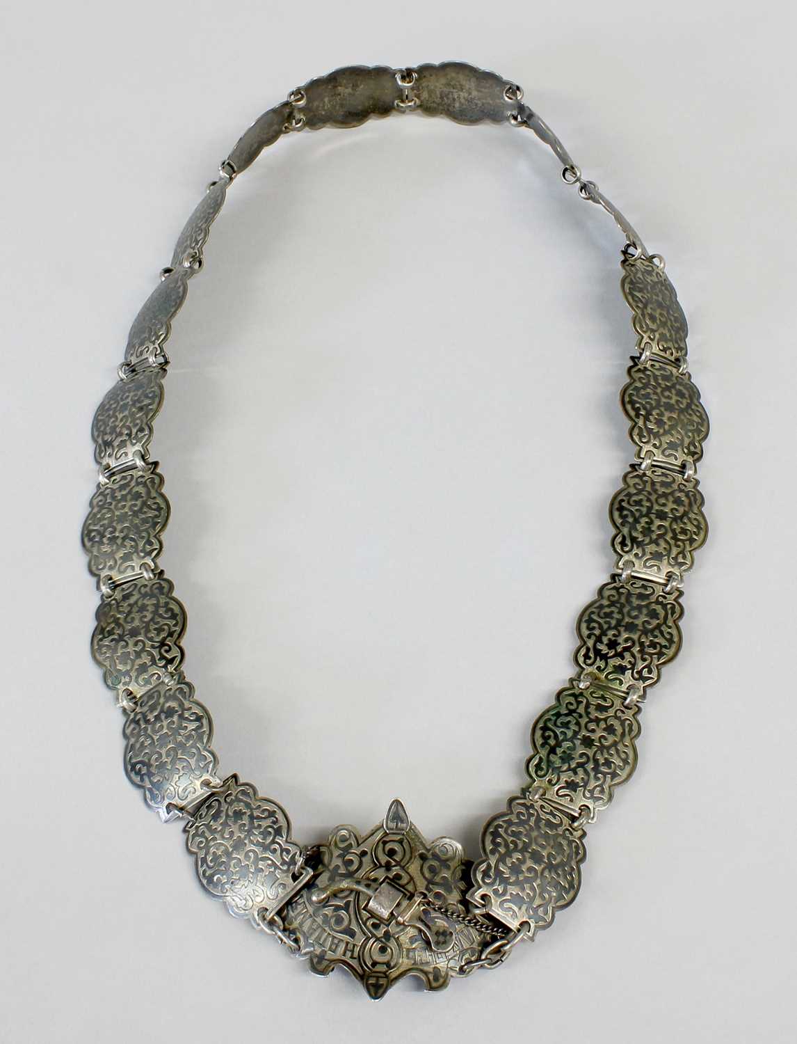 Lot 42 - A Russian Silver and Niello Belt, by