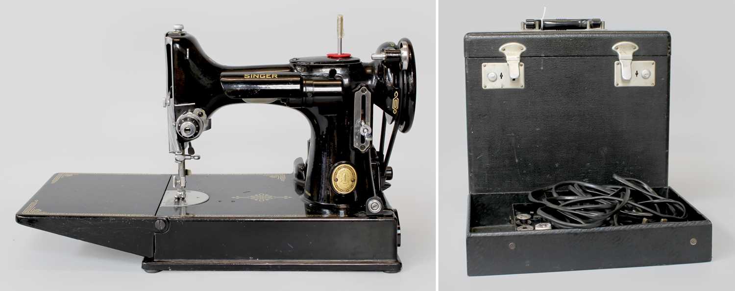 Lot 186 - A Singer Electric Sewing Machine No. 221K1,