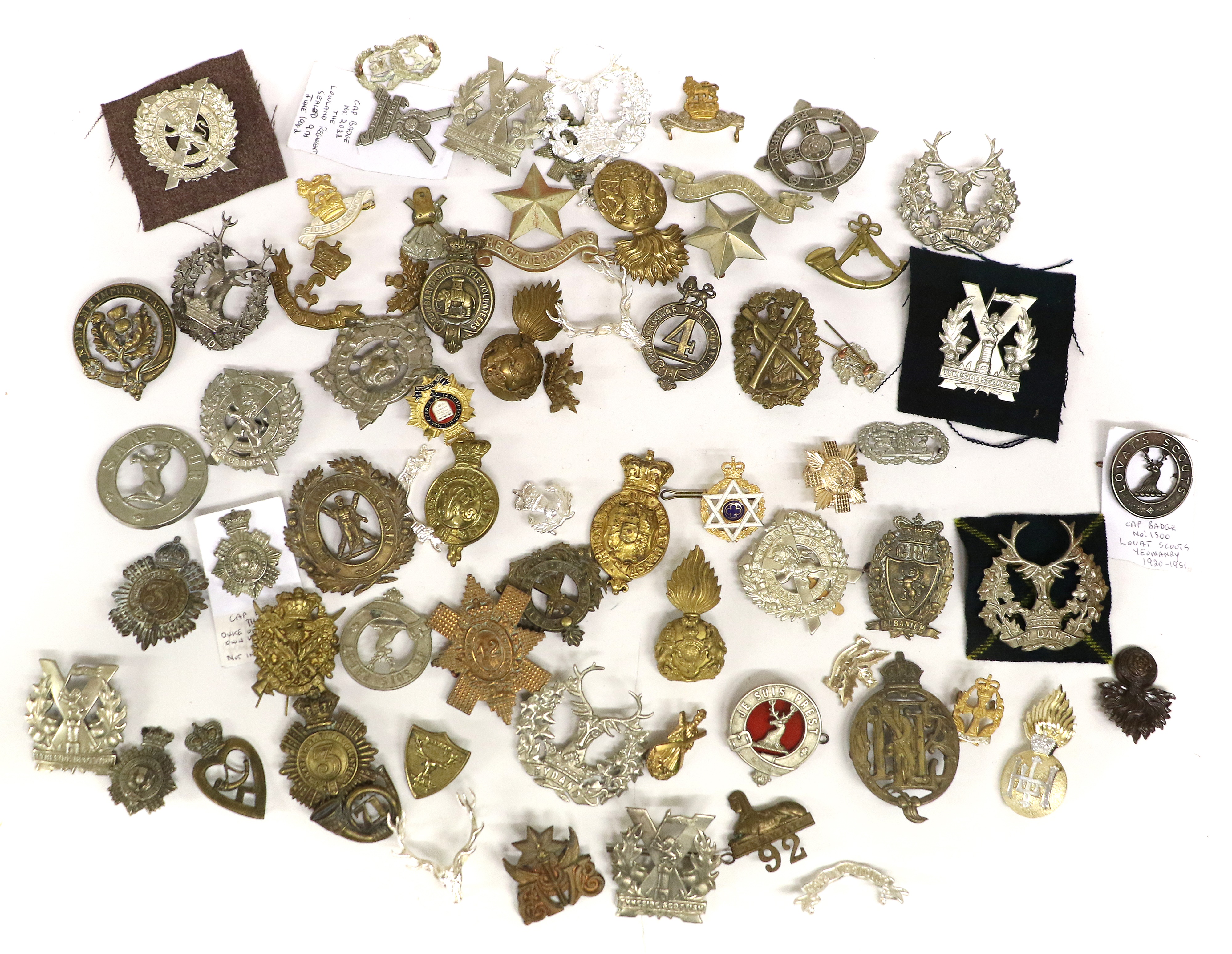 Lot 113 - An Edinburgh Rifle Volunteers Cap Badge, in