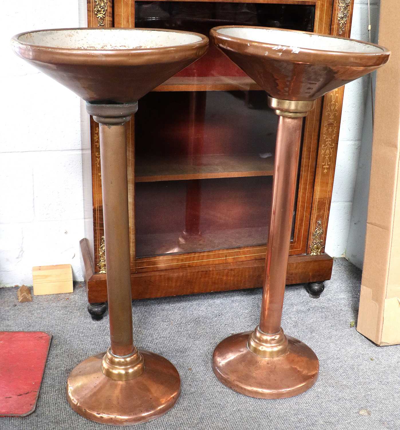 Lot 1317 - A Pair of Copper Stands, with shallow dish