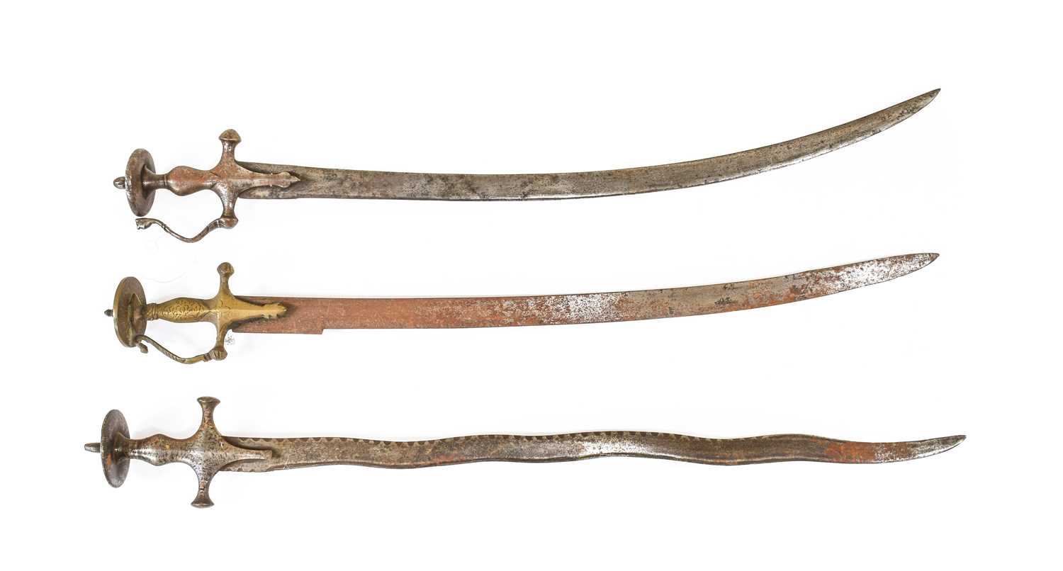 Lot 269 - A 19th Century Indian Talwar, the 72cm wavy