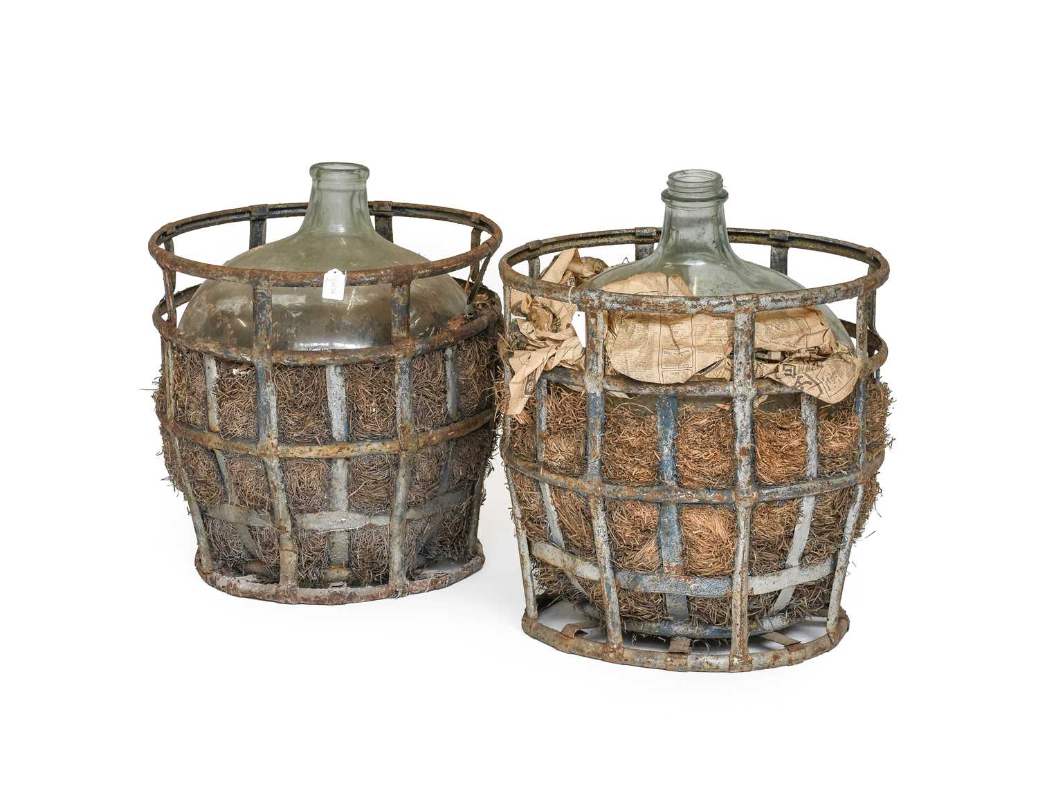 Lot 1163 - Two Large Glass Carbouys, each housed in an