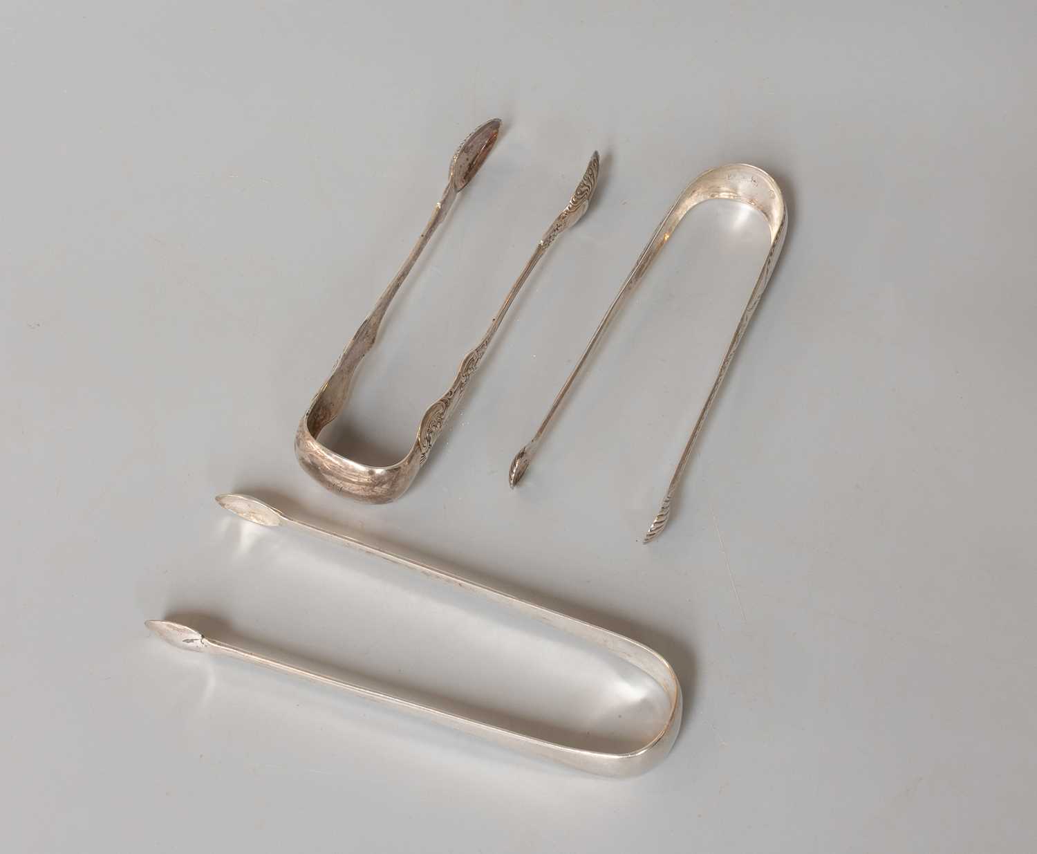 Lot 83 - A Pair of George III Irish Silver Sugar-Tongs,