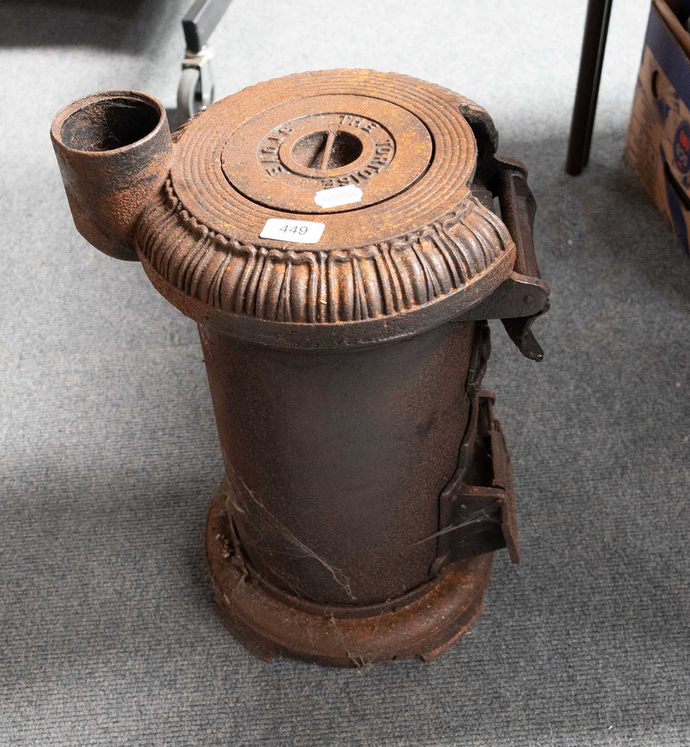Lot 449 - A Small Cast Iron Stove 'The Tortoise'