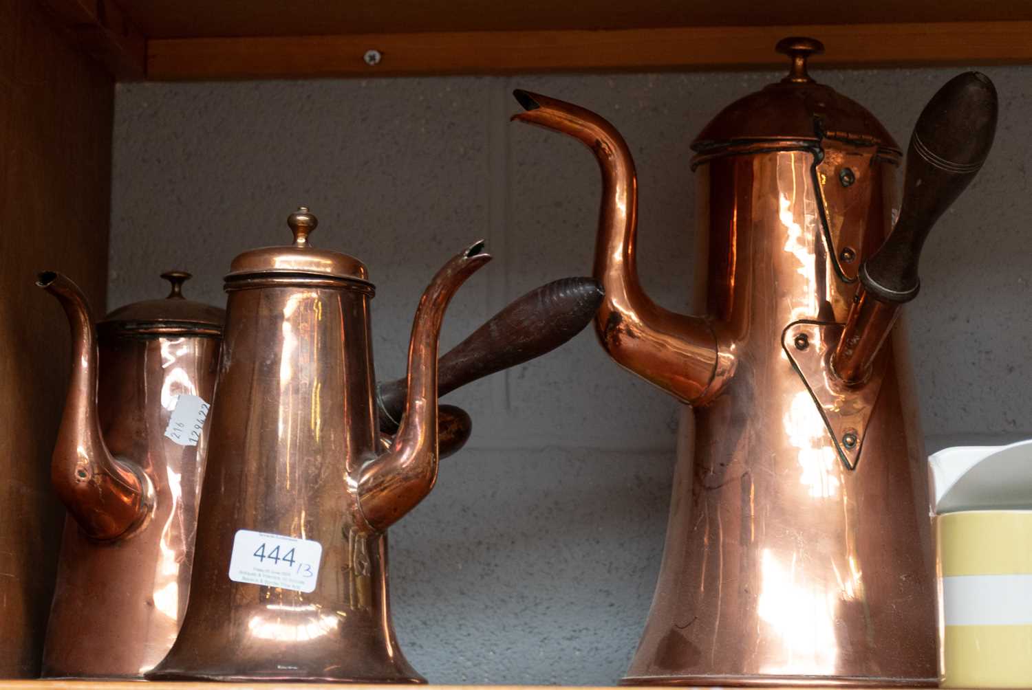 Lot 444 - Three Various Georgian Copper Coffee Pots,