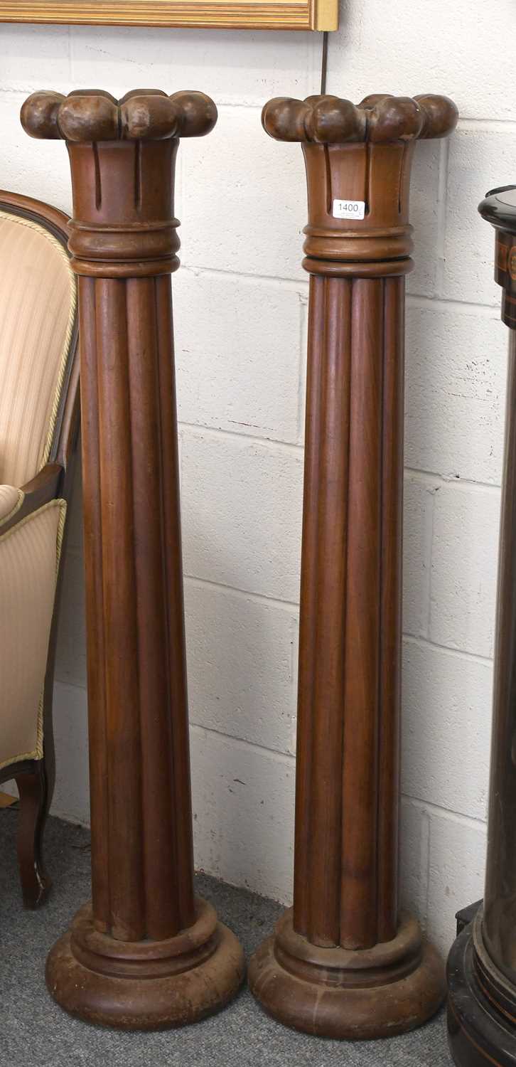 Lot 1400 - A Pair of Mahogany Fluted Columns With