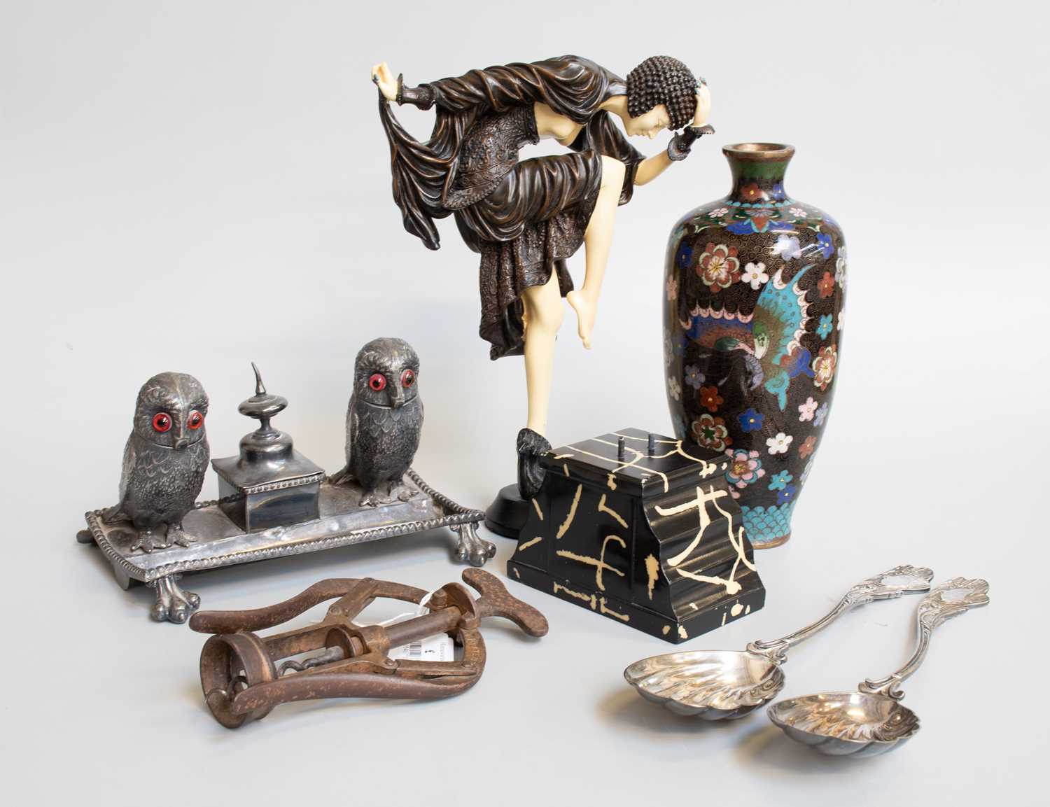 Lot 73 - A Novelty Metal Desk Stand Formed as a pair
