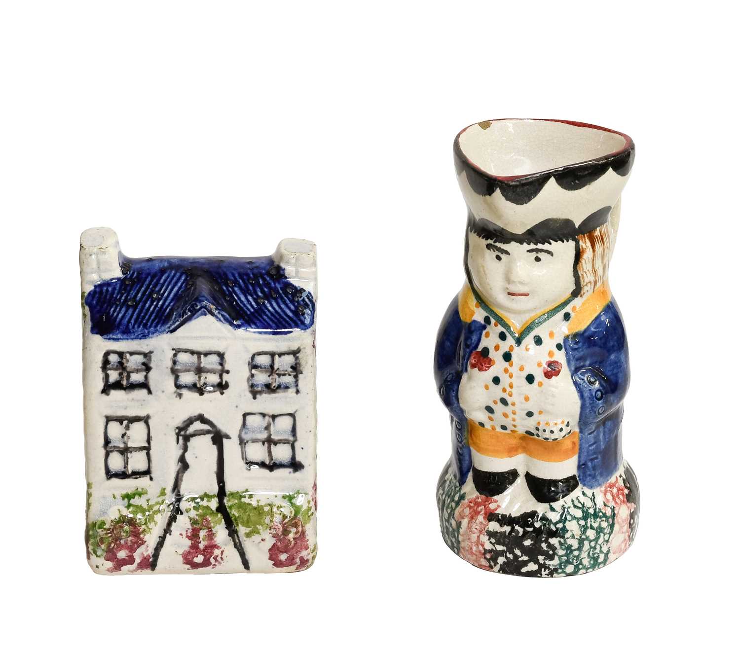 Lot 60 - A Yorkshire Prattware Miniature Toby Jug,