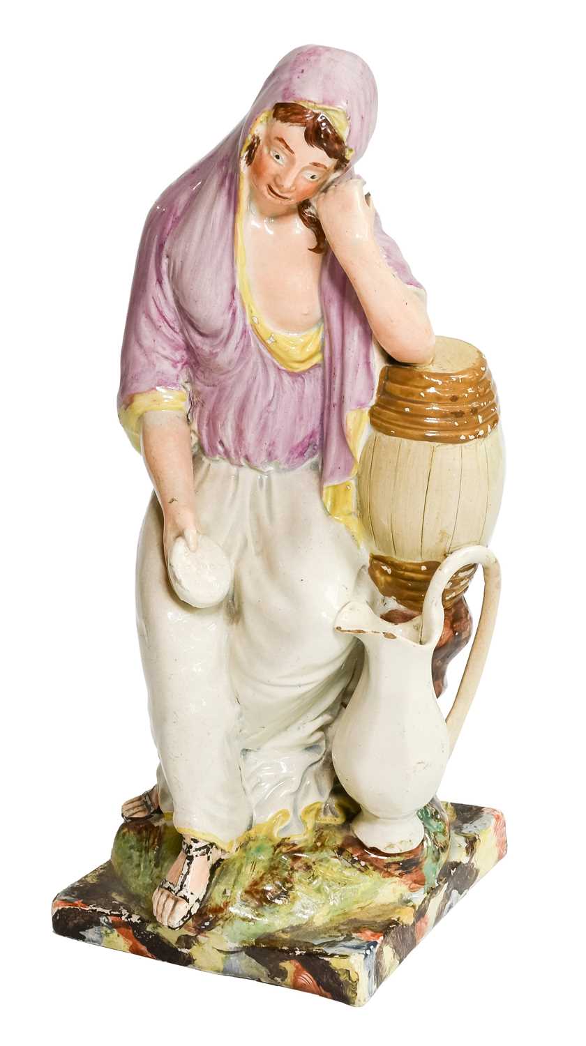 Lot 70 - A Staffordshire Pearlware "Widow of Zarepheth"