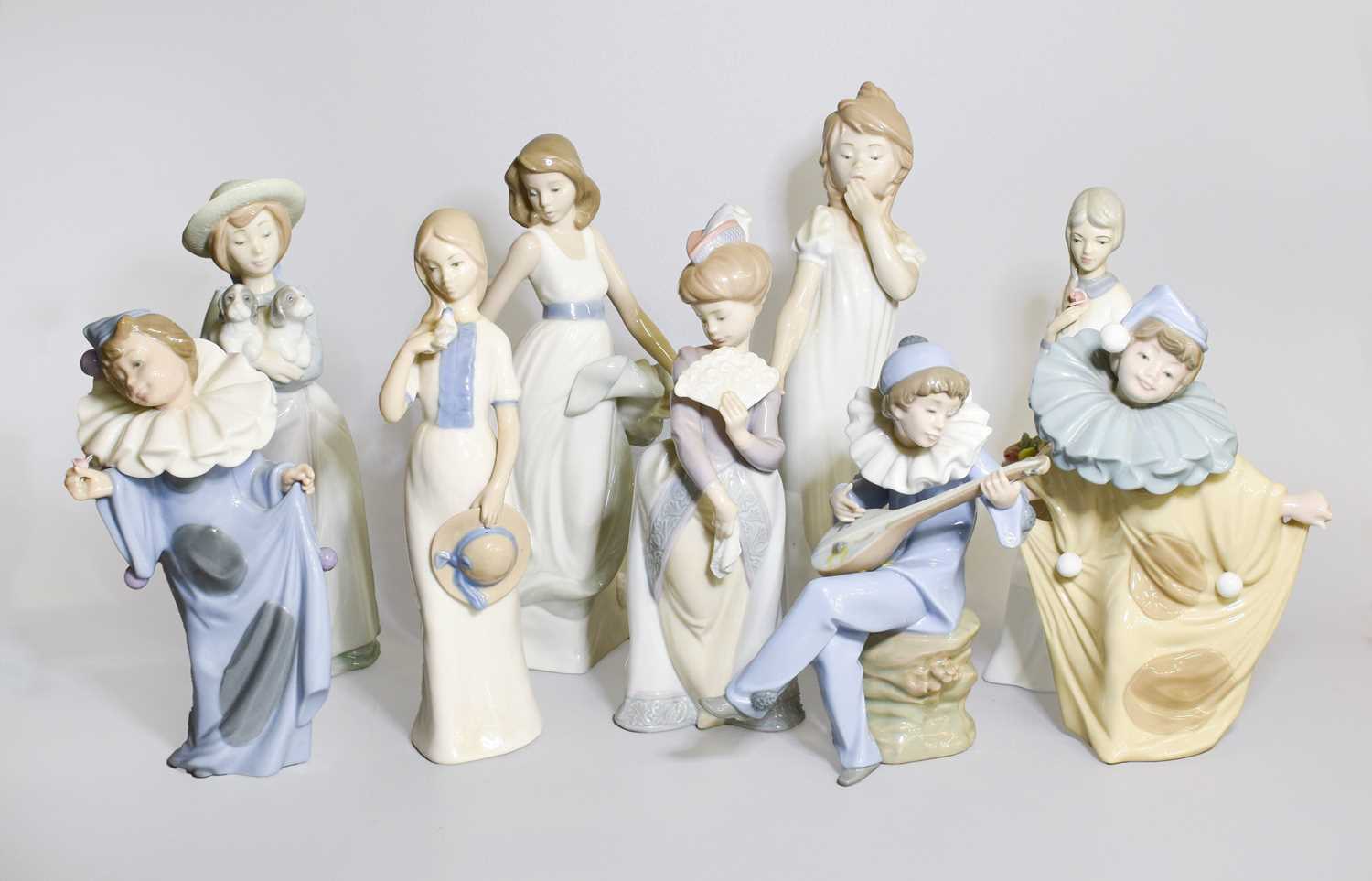 Lot 281 - Nine Spanish Porcelain Figures, including