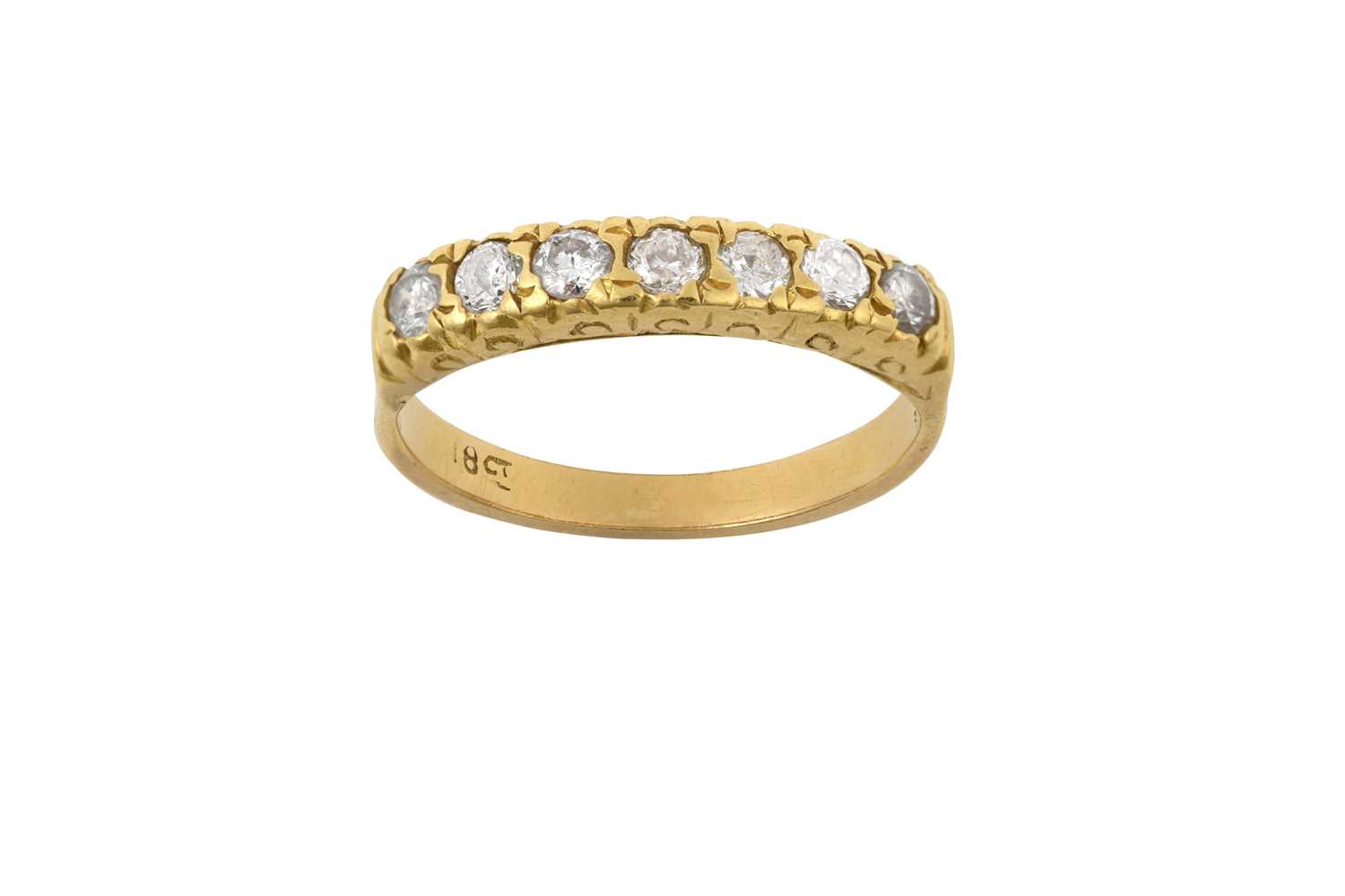 Lot 2349 - A Diamond Seven Stone Ring the round