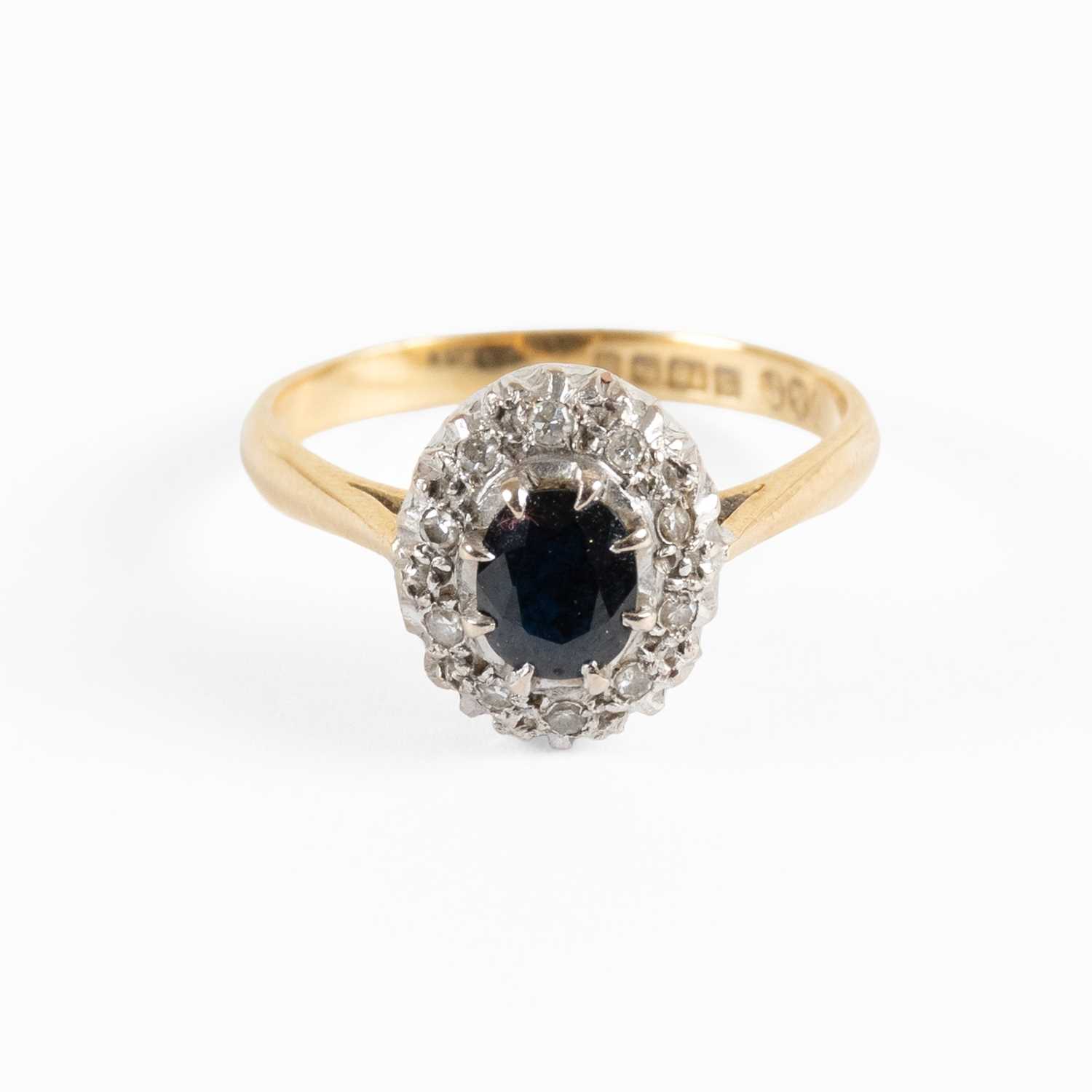 Lot 58 - An 18 Carat Gold Sapphire and Diamond Cluster
