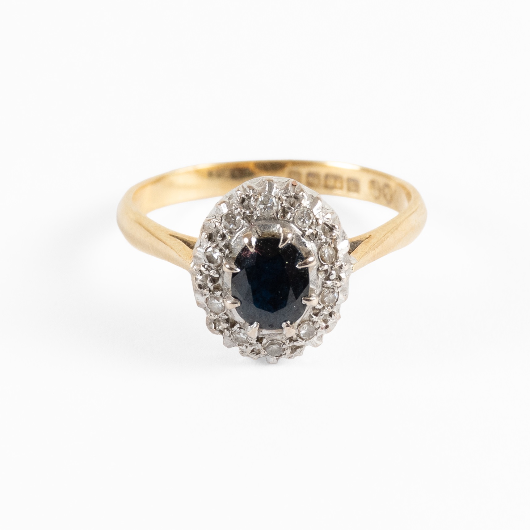 Lot 58 - An 18 Carat Gold Sapphire and Diamond Cluster