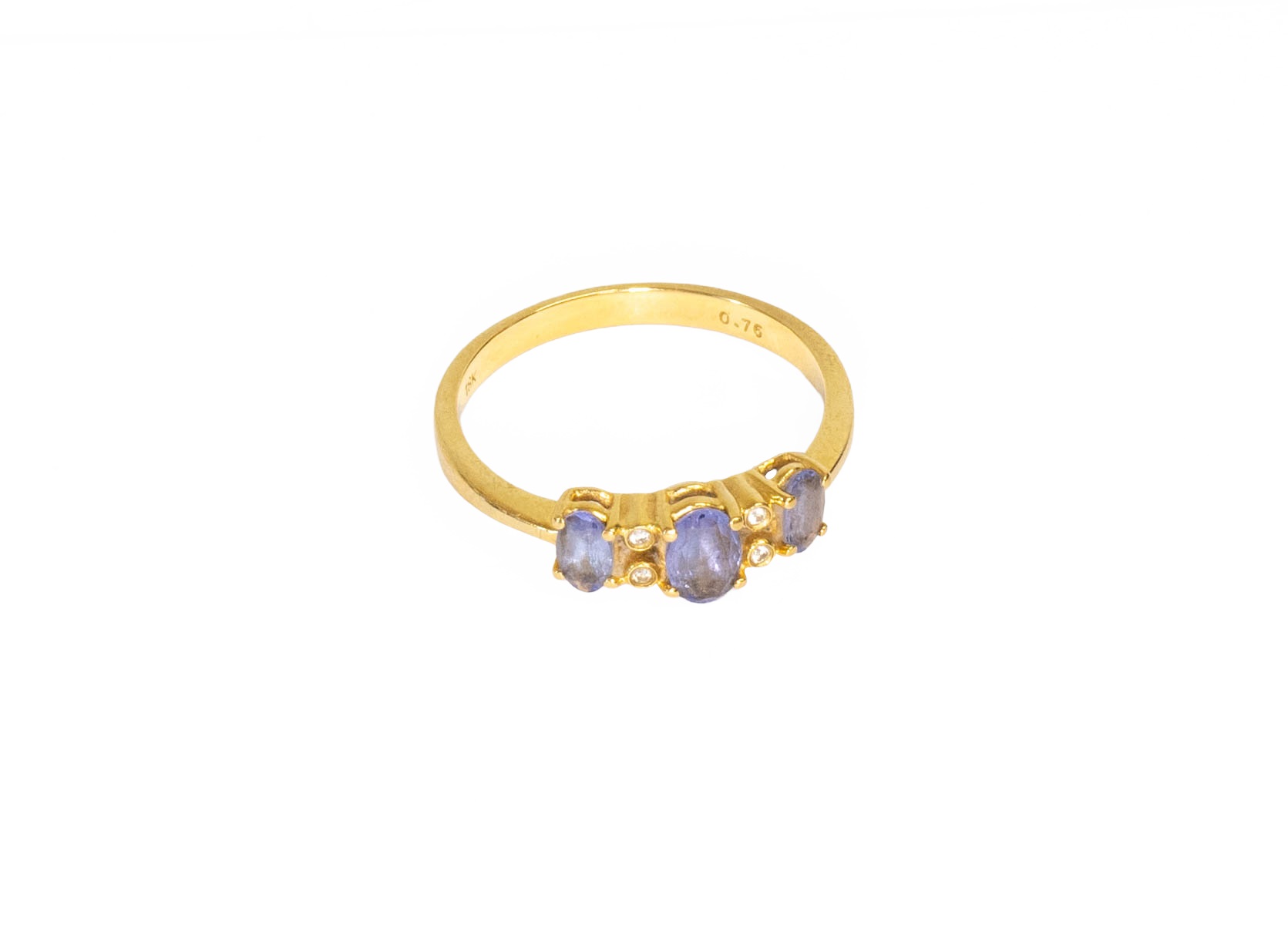 Lot 60 - A Tanzanite and Diamond Ring, three graduated