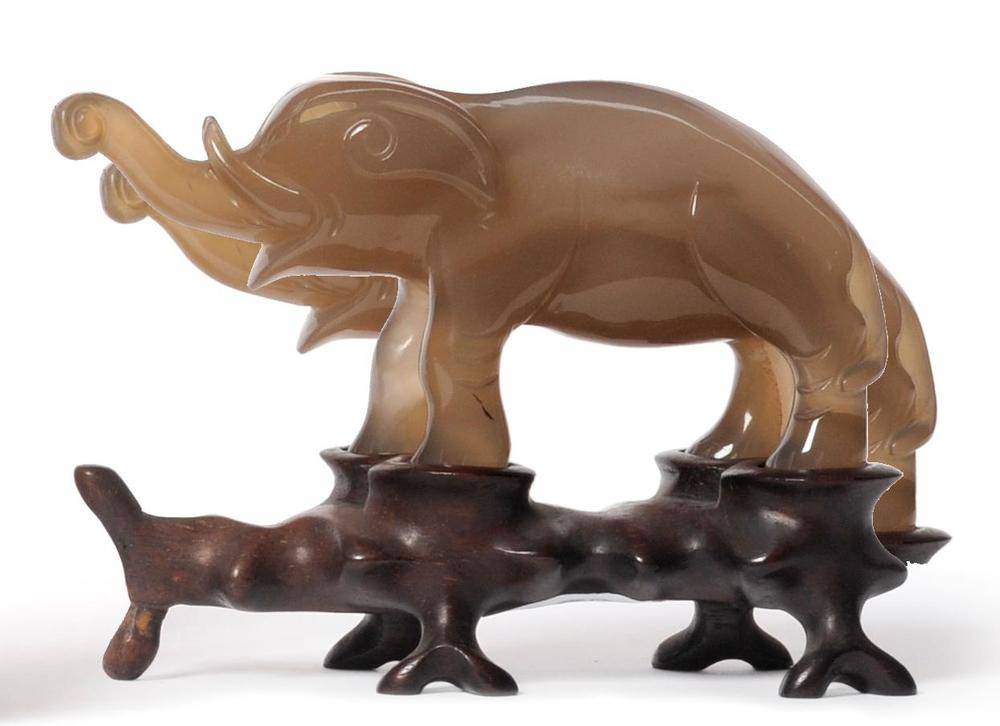 Lot 163 - A Chinese Carved Agate Elephant, late Qing
