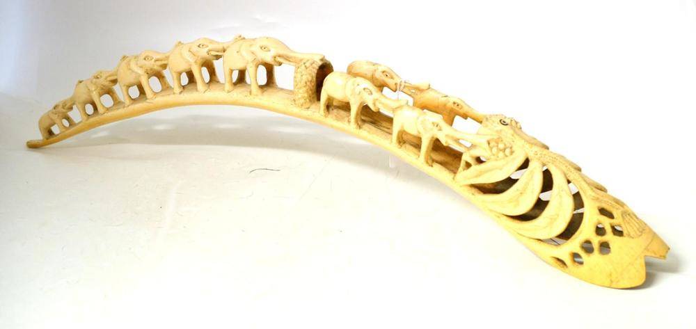 Lot 165 - An Indian Carved Hippopotamus Tusk Bridge of