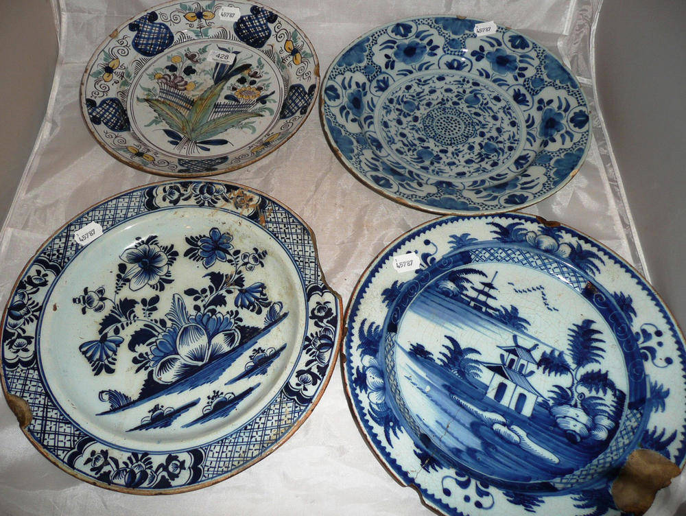 Lot 428 - Four assorted 18th century Delft chargers
