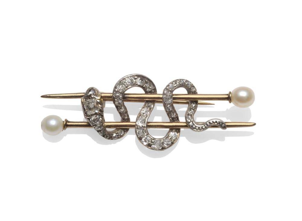 Lot 403 - A Diamond Set Serpent Brooch, two pins each
