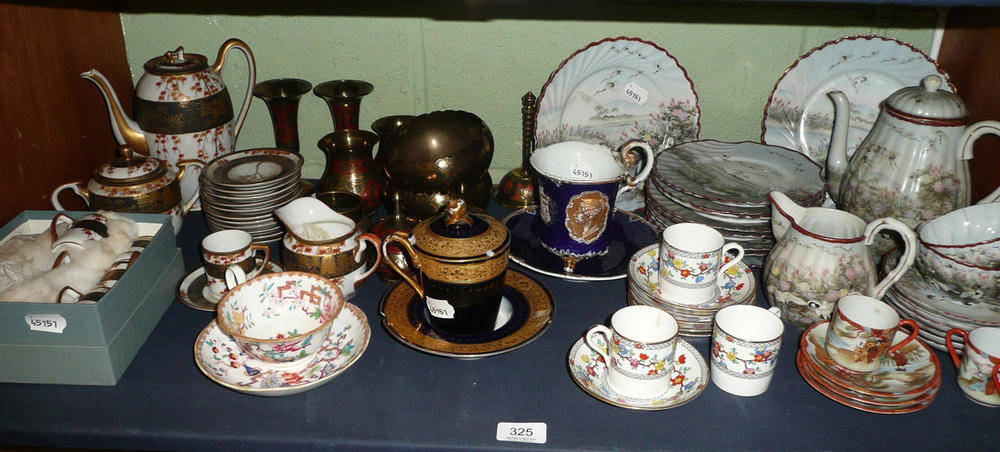 Lot 325 - A Japanese coffee set, a part Copeland