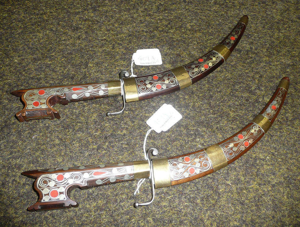 Lot 409 - Two Algerian Nimcha daggers