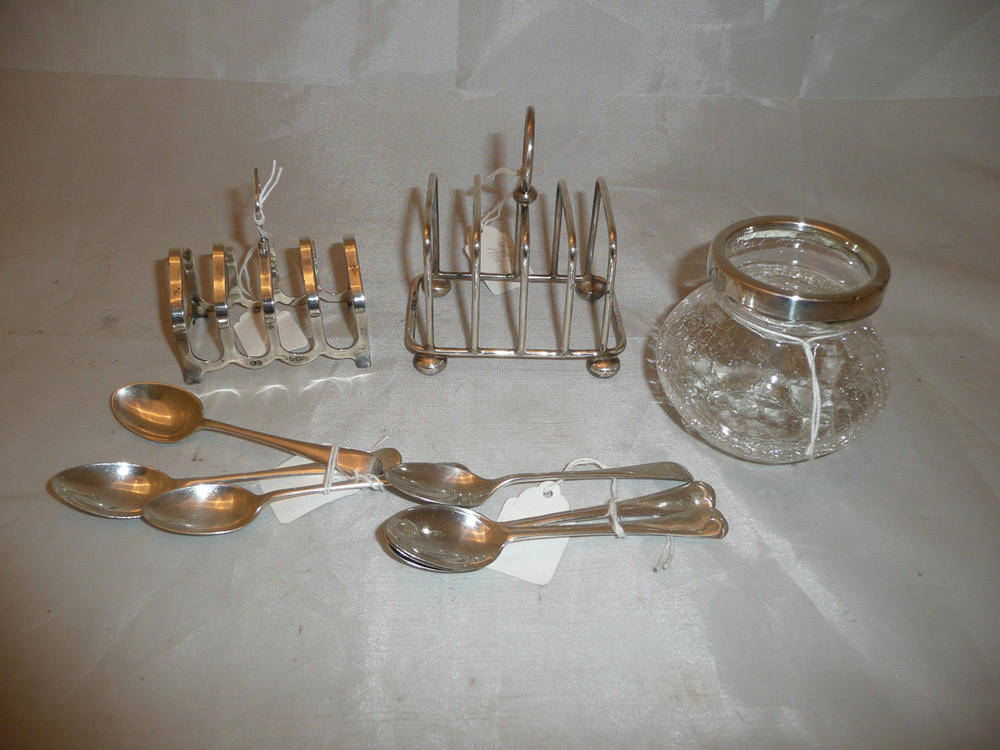 Lot 460 - Two silver toast racks, silver teaspoons and