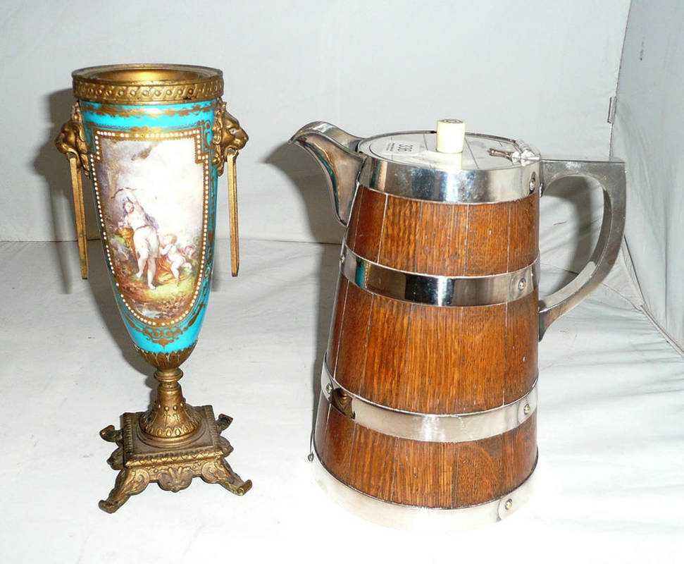 Lot 336 - An oak coopered punch jug and a Sevres style