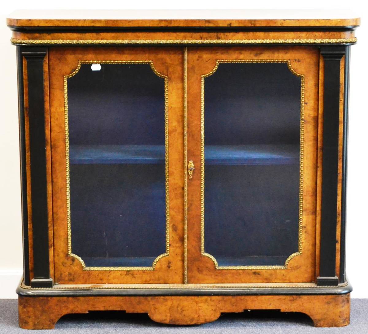 Lot 943 - A Victorian Figured Walnut, Ebonised and