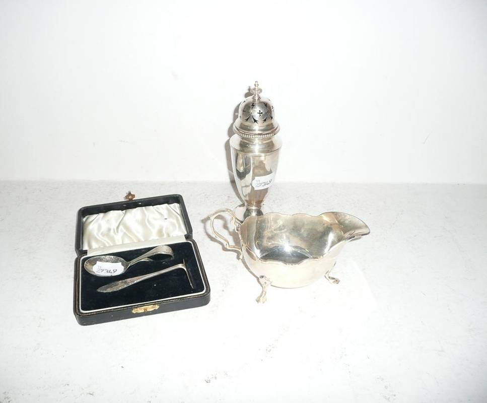 Lot 344 - Silver castor, silver sauce boat and a