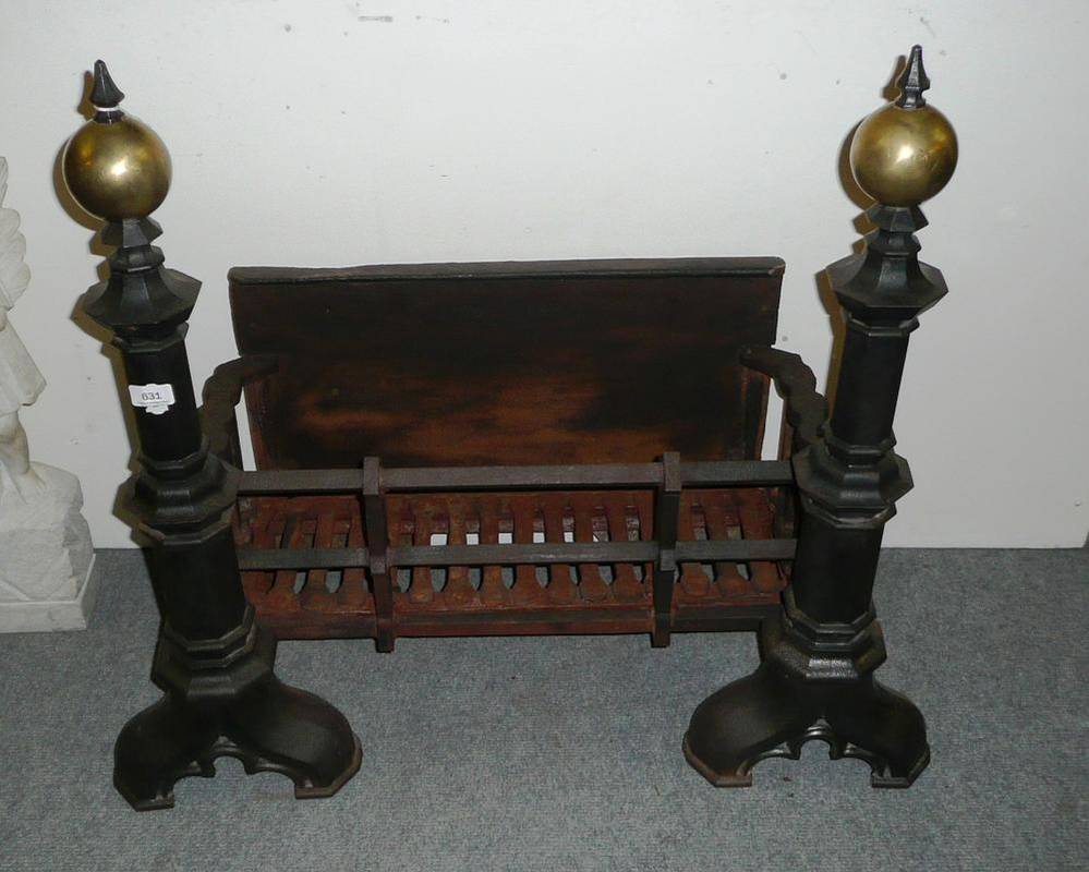 Lot 631 - A Medieval style cast iron and brass mounted