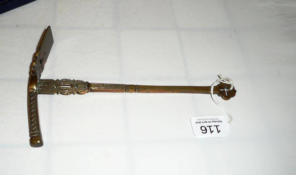 Lot 116 - A Brass "Wand" of Axe Form, the square blade