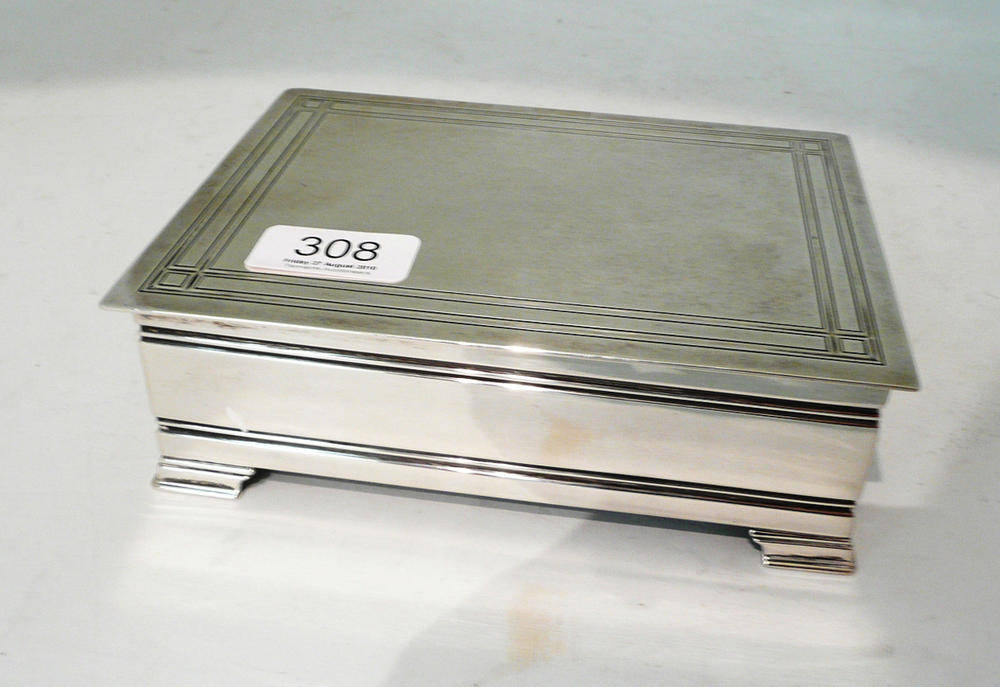 Lot 308 - A rectangular silver cigarette box, maker's