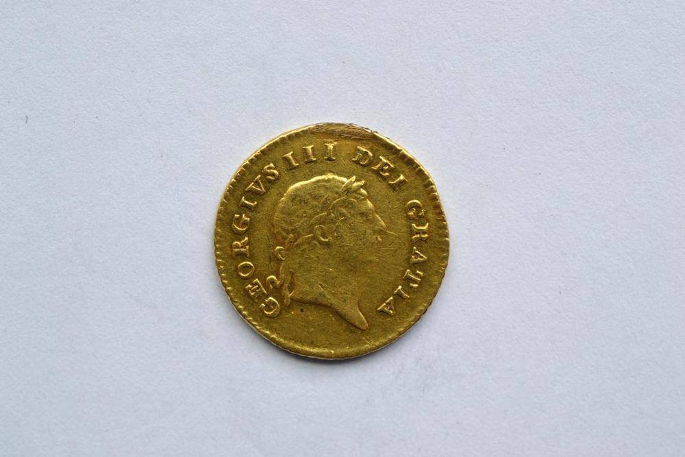 Lot 124 - George III Third Guinea 1809, contact marks,