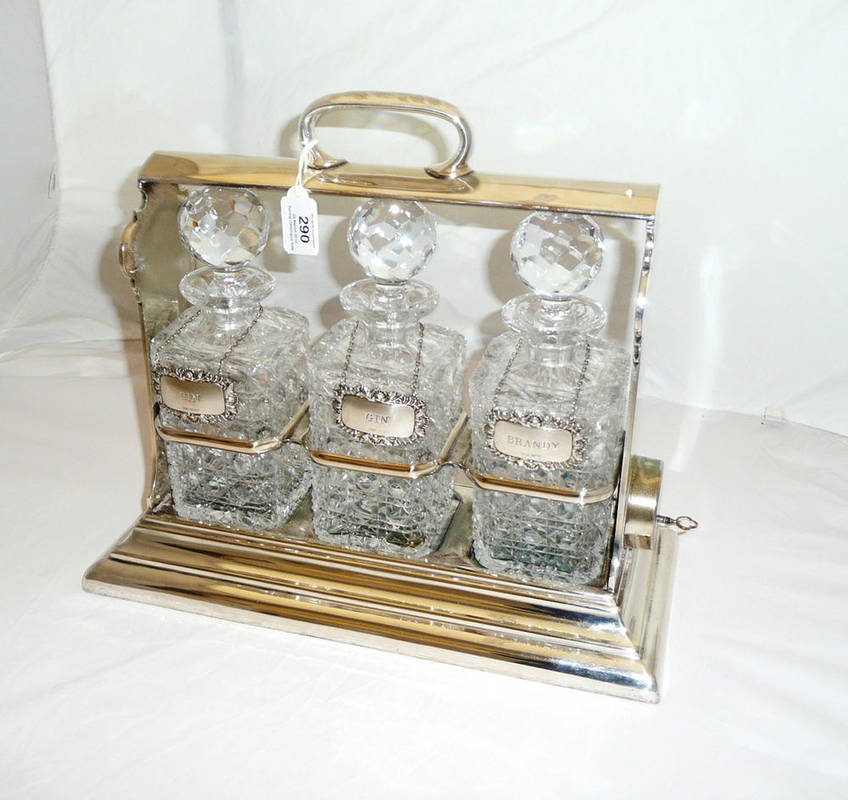 Lot 290 - A Silver Plated Holdfast Patent Three-Bottle