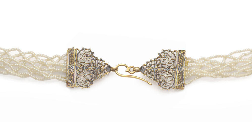 Lot 461 - A Seed Pearl Necklace, strands of entwined