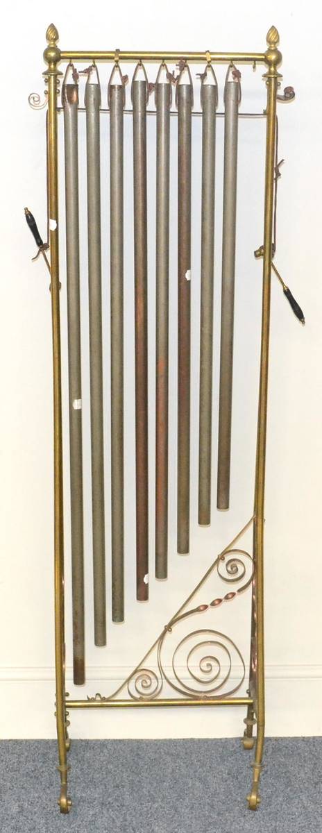 Lot 82 - An Upright Brass Frame of Eight Tubular Steel