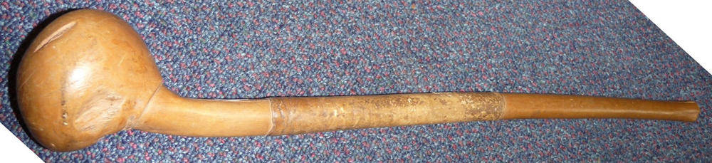 Lot 166 - An African Hardwood Throwing Club, of light