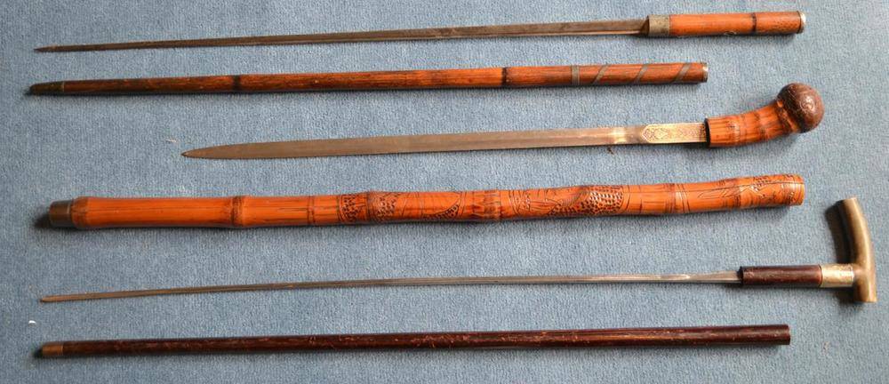 Lot 330 - A Mahogany Sword Stick, the 73.5cm fullered