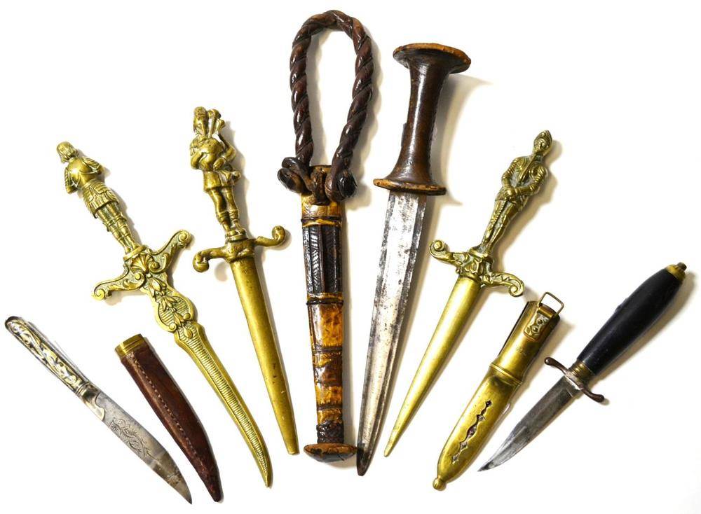 Lot 407 - A North African Dagger, with leather bound