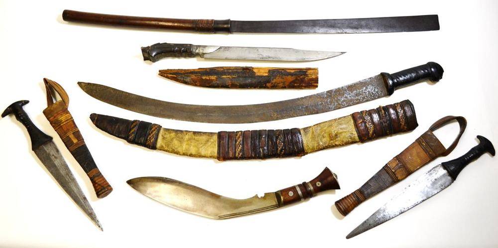 Lot 498 - A Tuareg Sword, with curved single edge