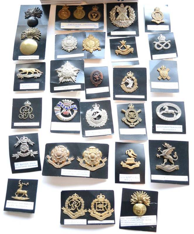 Lot 70 - A Collection of Thirty Military Cap Badges,