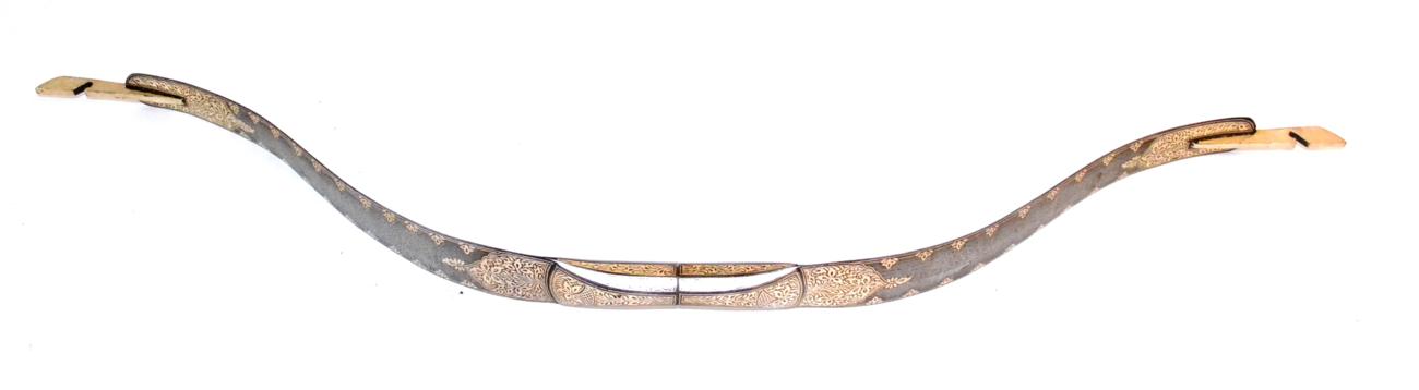 Lot 286 - An Indo-Persian Damascened Steel Bow, inlaid