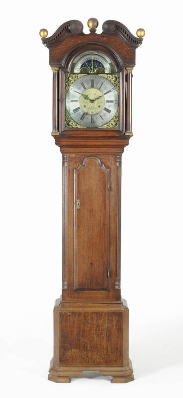 Lot 579 - An Oak Chiming Eight Day Longcase Clock with