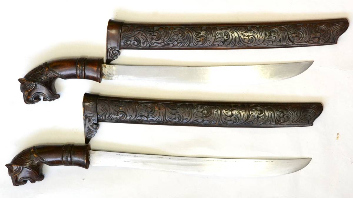 Lot 400 - Two Malayan Parangs, each with 38cm single