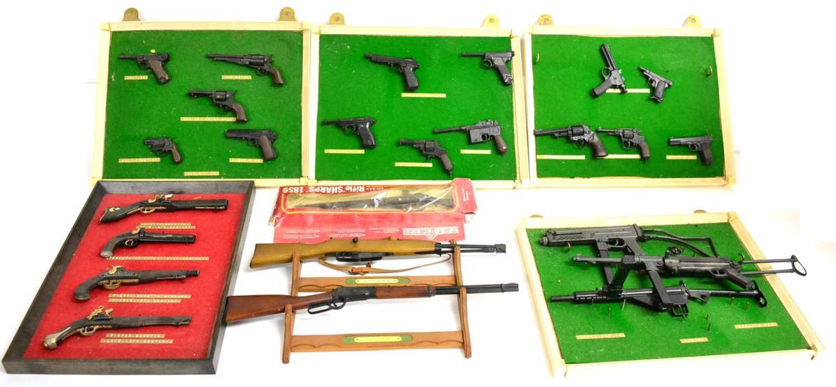 Lot 208 - A Collection of Twenty Four Miniature Model