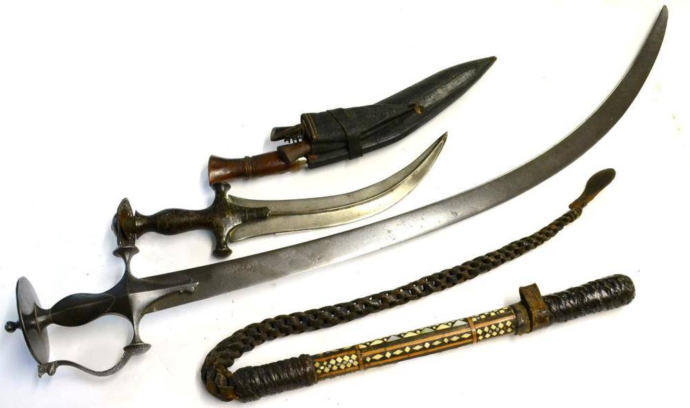 Lot 327 - A 19th Century Indian Talwar, the 83 cm