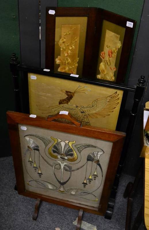 Lot 1093 - Edwardian oak folding screen with style