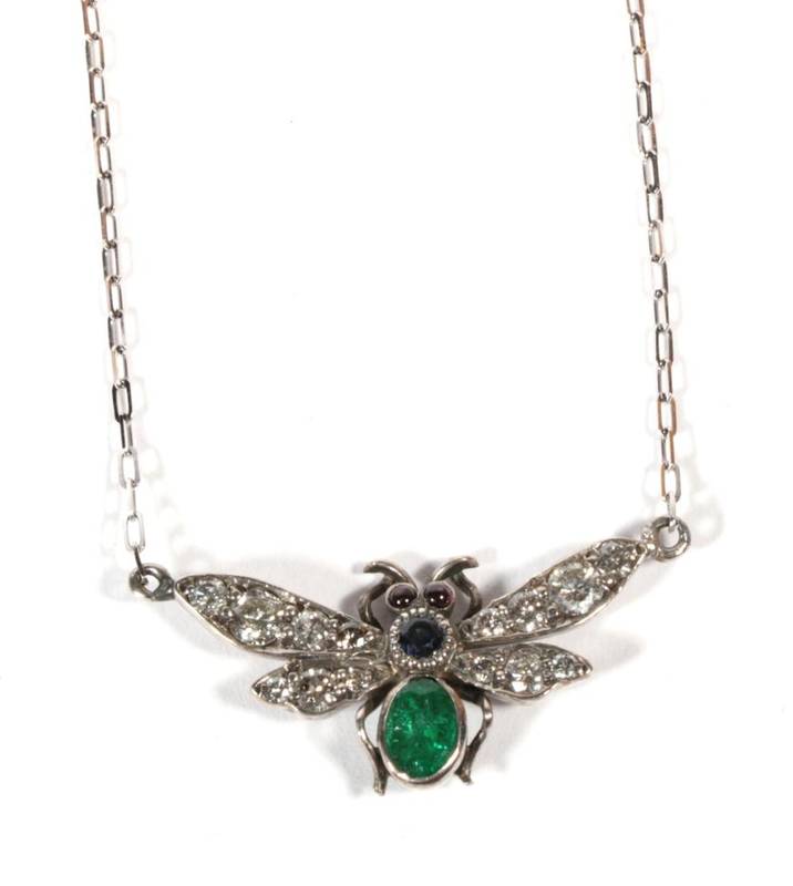 Lot 233 - A diamond and gem set fly pendant necklace,