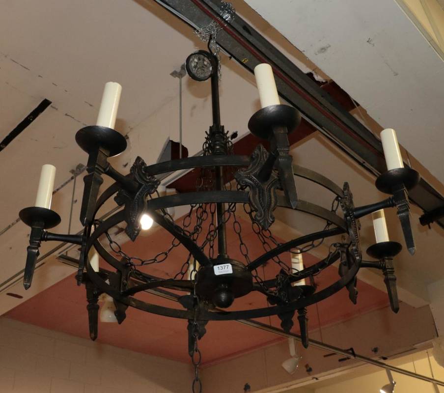 Lot 1377 - A large eight light Medieval style light