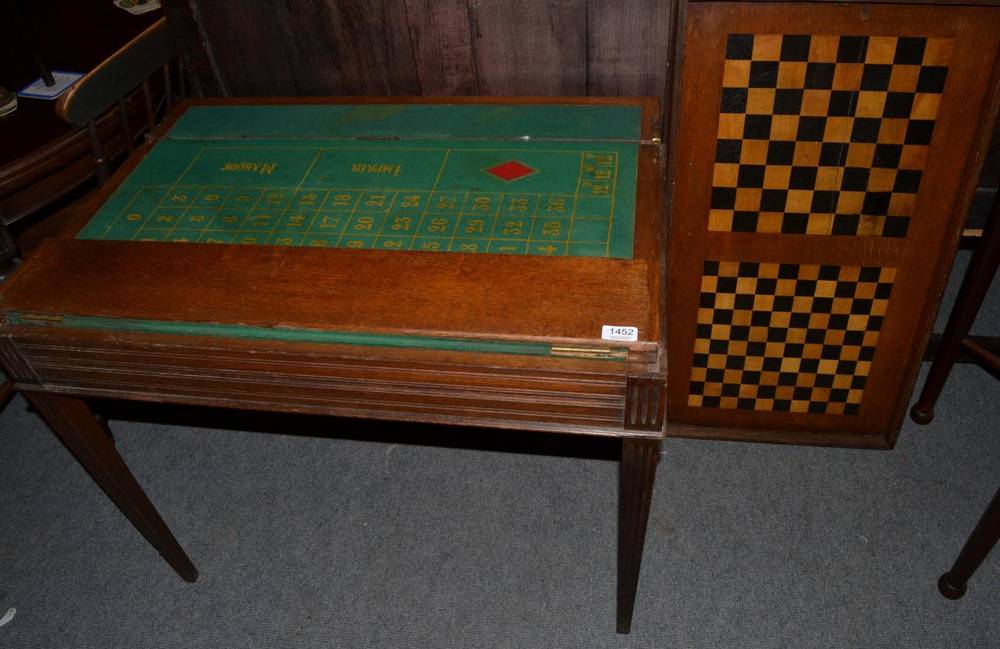 Lot 1452 - ~ A Victorian oak gaming table with